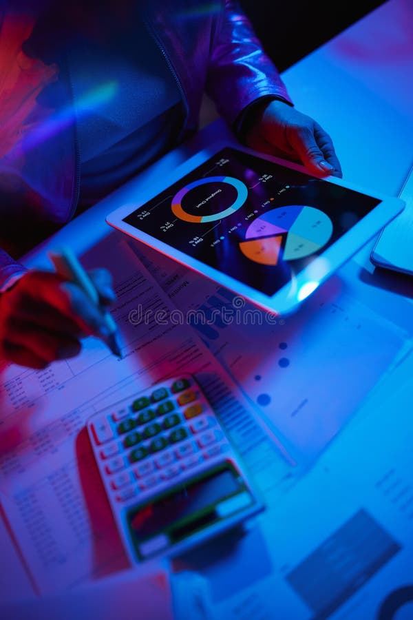 Closeup on Modern Female with Calculator Exploring Graphs Stock Image ...
