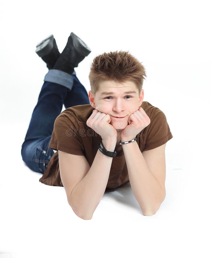 Closeup. Modern Guy Lying on the Floor and Looking at Camera Stock ...