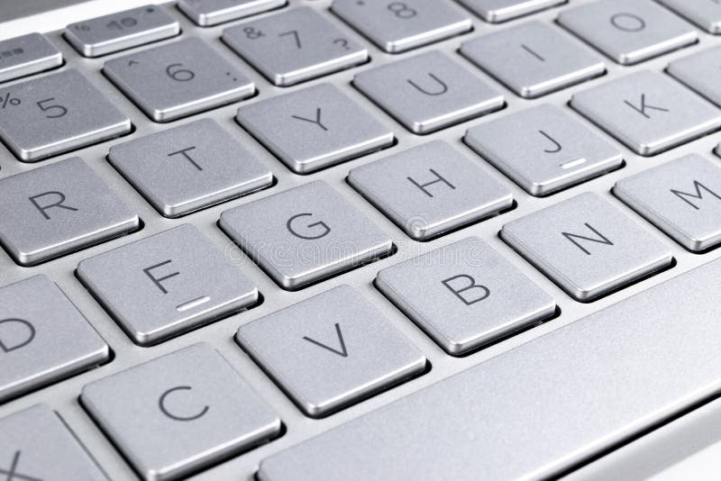 Closeup of a Modern Silver Laptop Computer Keyboard. Laptop Keyboard ...