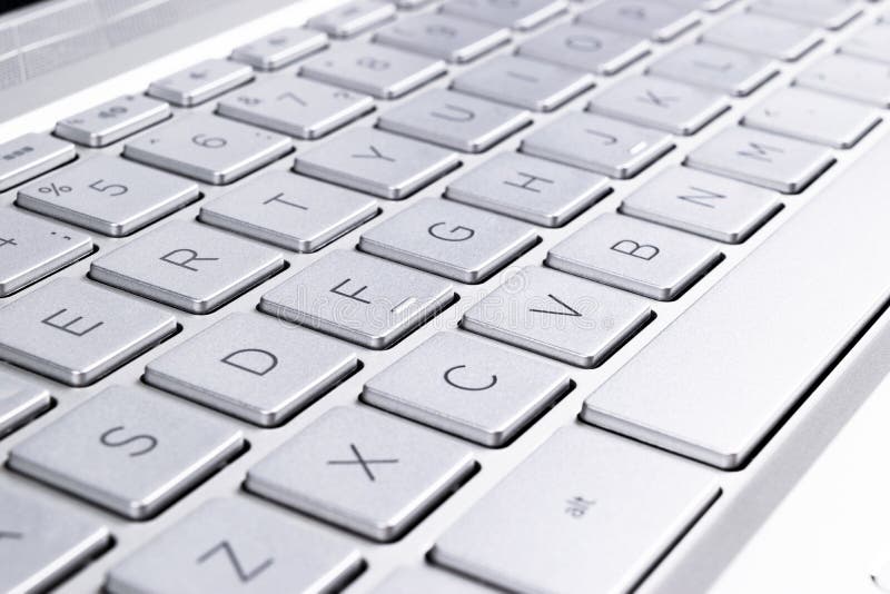 Closeup of a Modern Silver Laptop Computer Keyboard. Laptop Keyboard ...
