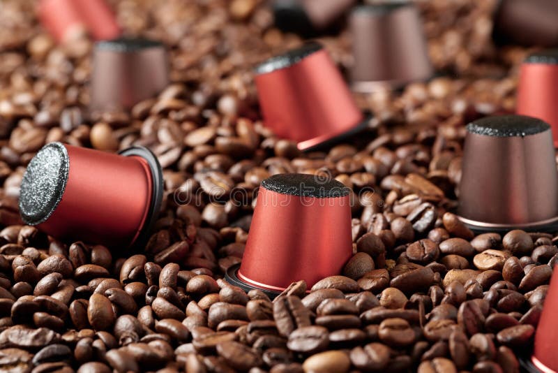 Closeup of Multi-colored Capsules with Coffee of Different Varieties ...