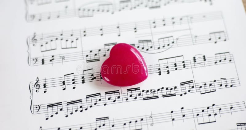 Closeup of Musical Notes and Red Heart Stock Footage - Video of note ...