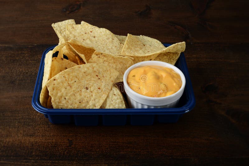 Closeup Nacho Chips with Cheese in Plastic Container Stock Image ...