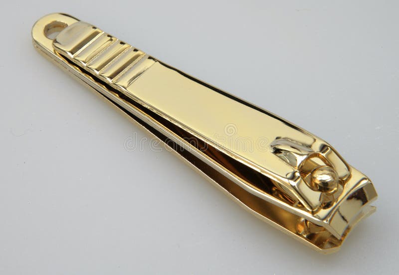 Closeup of Nail Clippers in Gold Color Stock Image - Image of beautiful ...