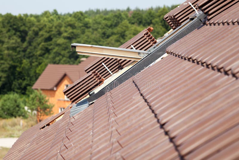 Closeup of New Roof with Skylight and Natural Red Tile. Stock Image ...