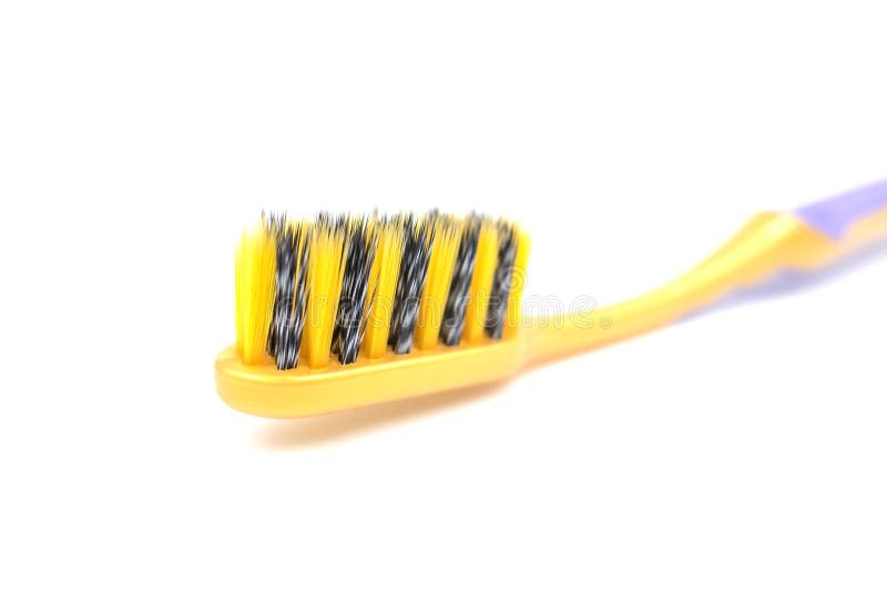 Closeup New Yellow Toothbrushes Isolated on a White Background Stock ...