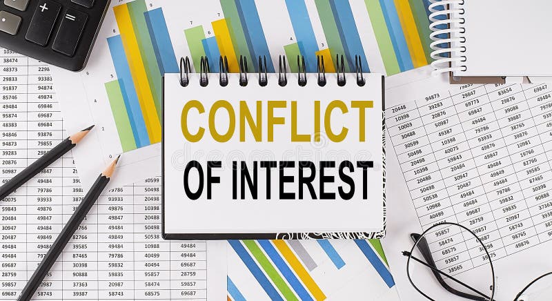 CONFLICT of INTEREST Text Written on a Notebook on Chart with Keyboard ...
