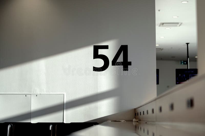 Closeup of a 54 Number on a White Concrete Wall Stock Image - Image of ...