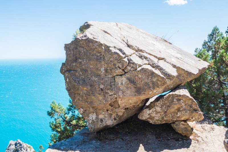 Closeup O Big Rocks with Trees in Border the Sea. Stock Photo - Image ...