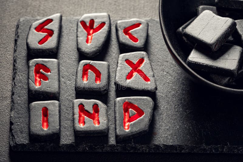 Old Enchanted Rune with Red Signs Based on Futhark Alphabet Stock ...