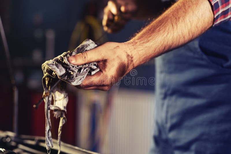Closeup of the Hand of Car Mechanic Checking Oil Stock Image - Image of ...