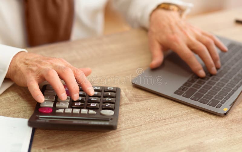 Closeup of Old Man& X27;s Hands Using Calculator and Laptop, Cropped ...