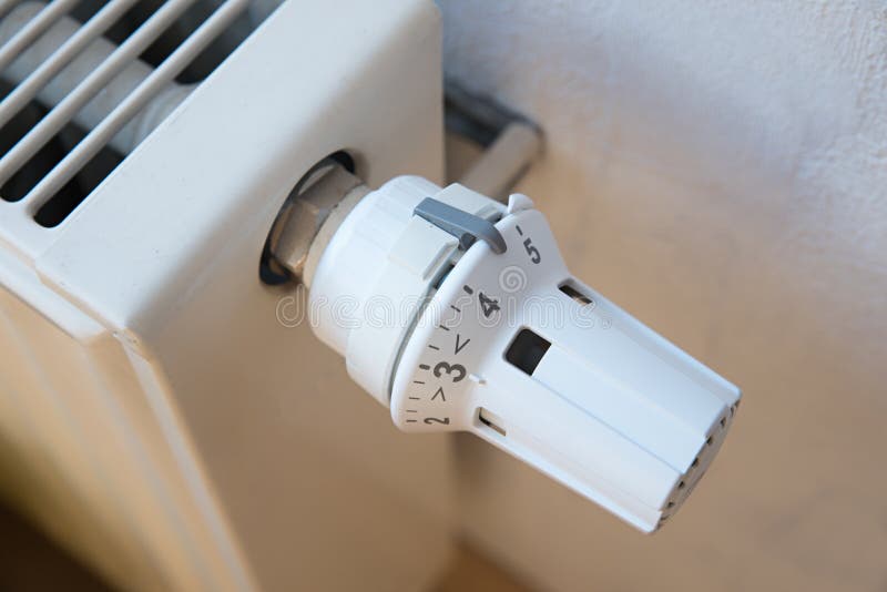 Closeup of an Old Radiator with Regulator Turned on High Stock Photo ...