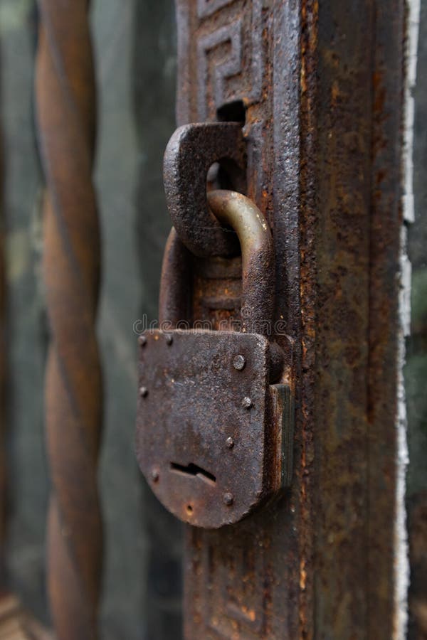 Closeup of an Old Rusted Padlock on a Gate Editorial Photography ...