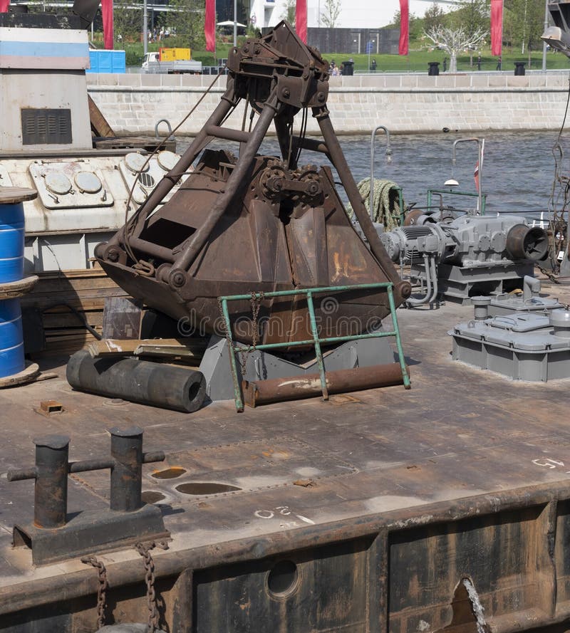 Closeup of an Old Rusty Clamshell Bucket from Wire Ropes and Chains ...