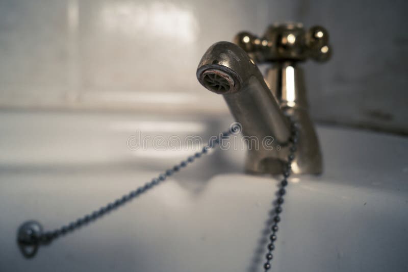 Closeup of Old Tap Spout on a White Sink Stock Photo - Image of water ...