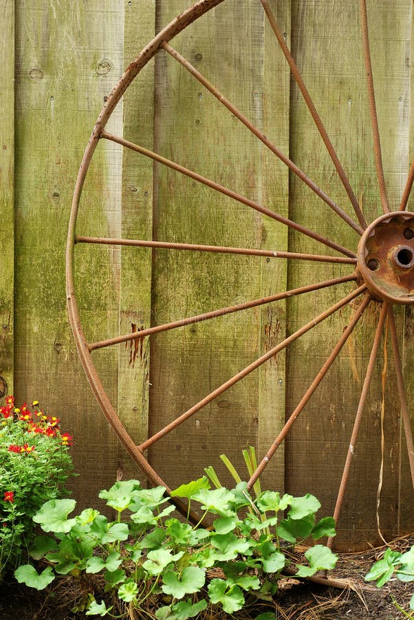 Antique Wooden Wagon Wheel on Rustic White Background Stock Photo ...