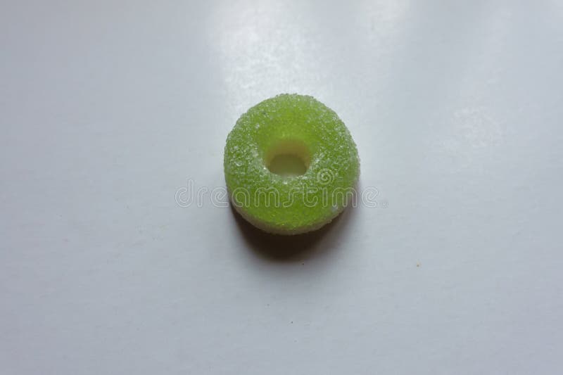 Closeup of One Green and White Sugar Coated Jelly Ring Candy Stock ...