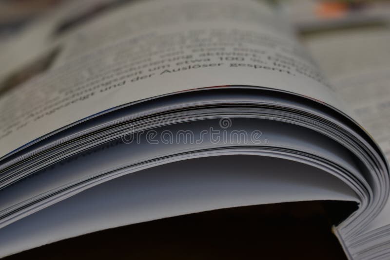 Closeup of an Open Book with Many Pages on the Desk Stock Photo - Image ...