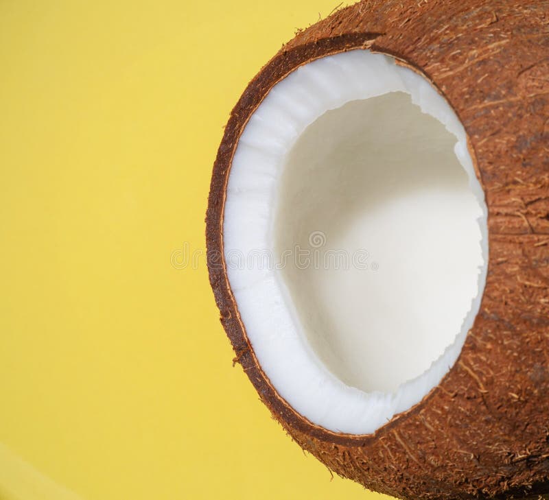 Closeup of Open Coconut on Yellow Background, Macro of Coconut Texture ...
