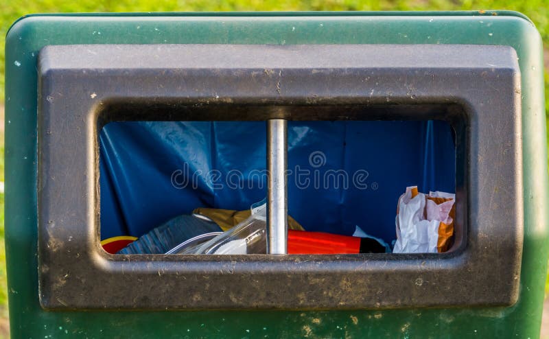 Opening the Lid of the Garbage Can To Throwing Out the Trash. Stock ...