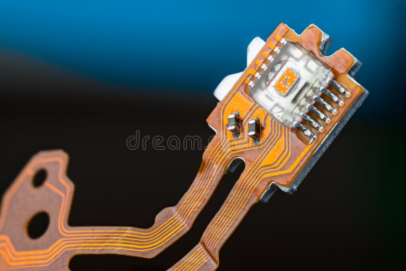 Electronic Flex Circuit Board Detail on Blue Plastic Membrane Curled To ...