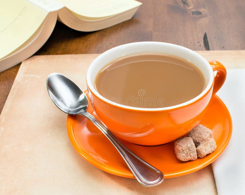 Closeup of Orange Coffee Cup Stock Image - Image of morning, spoon ...