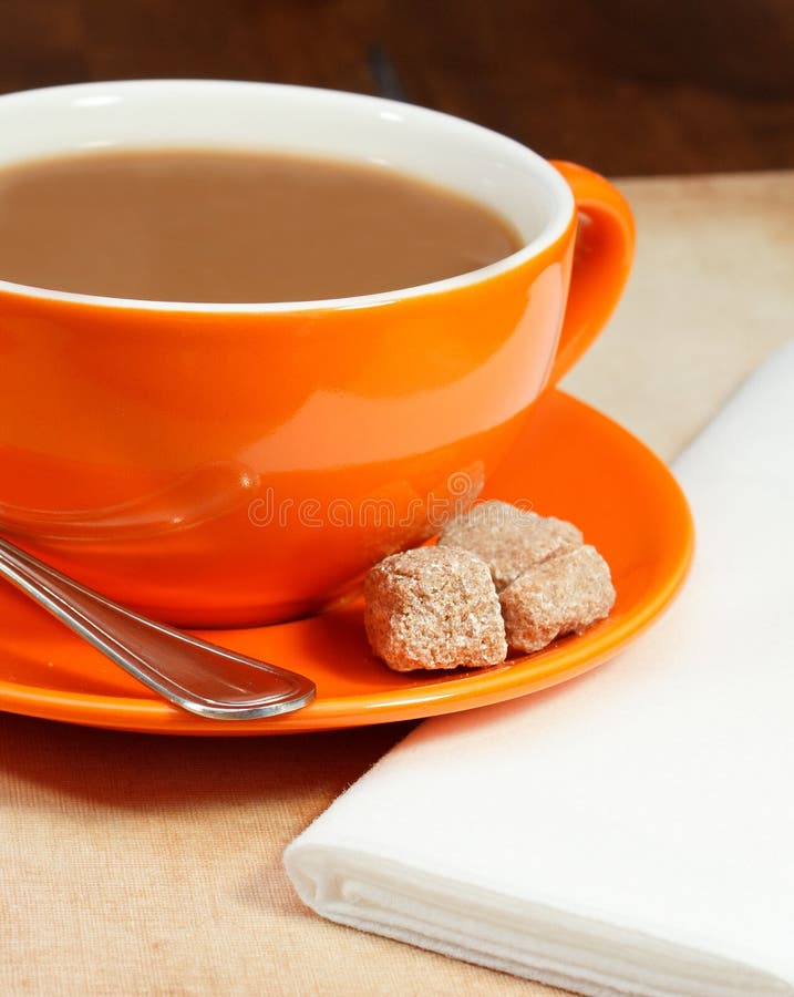 Closeup of Orange Coffee Cup Stock Photo - Image of breakfast, sugar ...