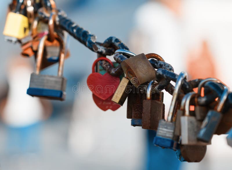Closeup of a Padlock Hanging on Chain Link of the Bridge / Fence Stock ...