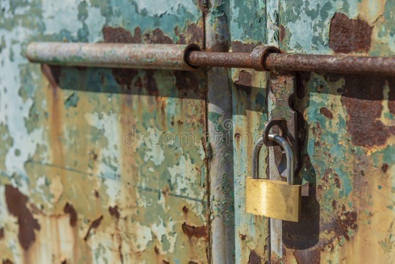 Closeup of Padlock on Rusty Metal Door of Abandoned Building Stock ...