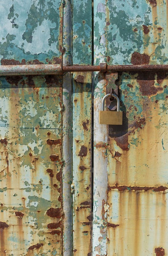 Closeup of Padlock on Rusty Metal Door of Abandoned Building Stock ...