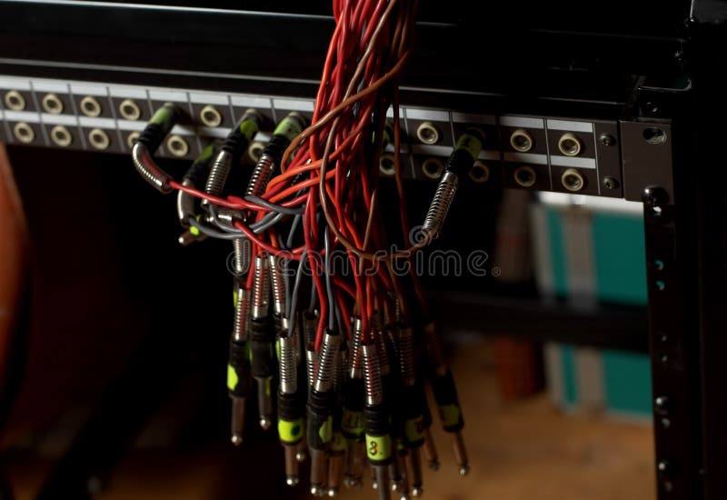 Patch bay and audio cables stock photo. Image of audio - 167417028
