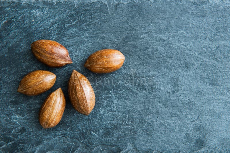 Closeup on Pecans on Stone Substrate Stock Photo - Image of pecans ...