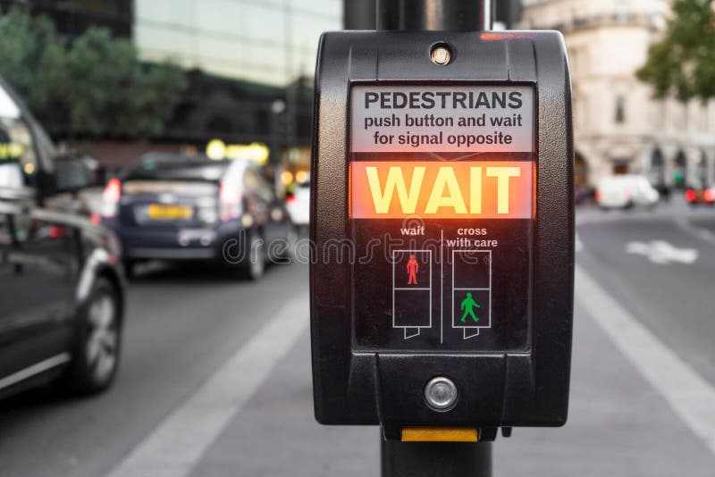 Closeup of a Pedestrian Button on the Road with Wait Writing, Traffic ...