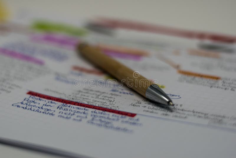 Closeup of a Pen on a Notebook with Highlighted Parts Stock Image ...