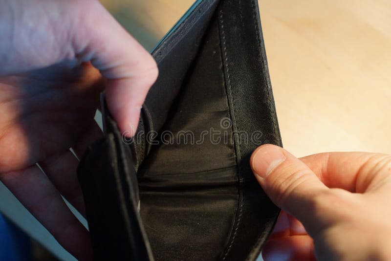 Closeup of a Person Opening an Empty Wallet - Concept of Crisis and ...