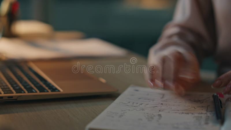 Closeup Person Taking Notes at Office Desk. Businesswoman Working on ...