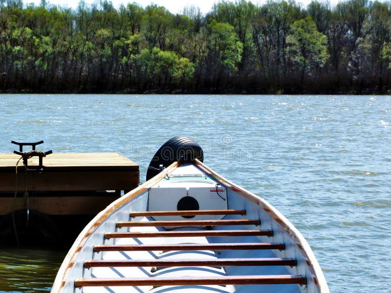 Perspective Closeup View of Empty Rowing Canoe. Skull 8 Moored at a ...