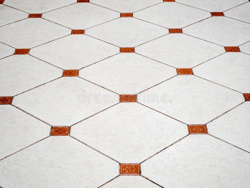 Closeup Photo of a Light Large Square Tile with Small Brown Squares ...