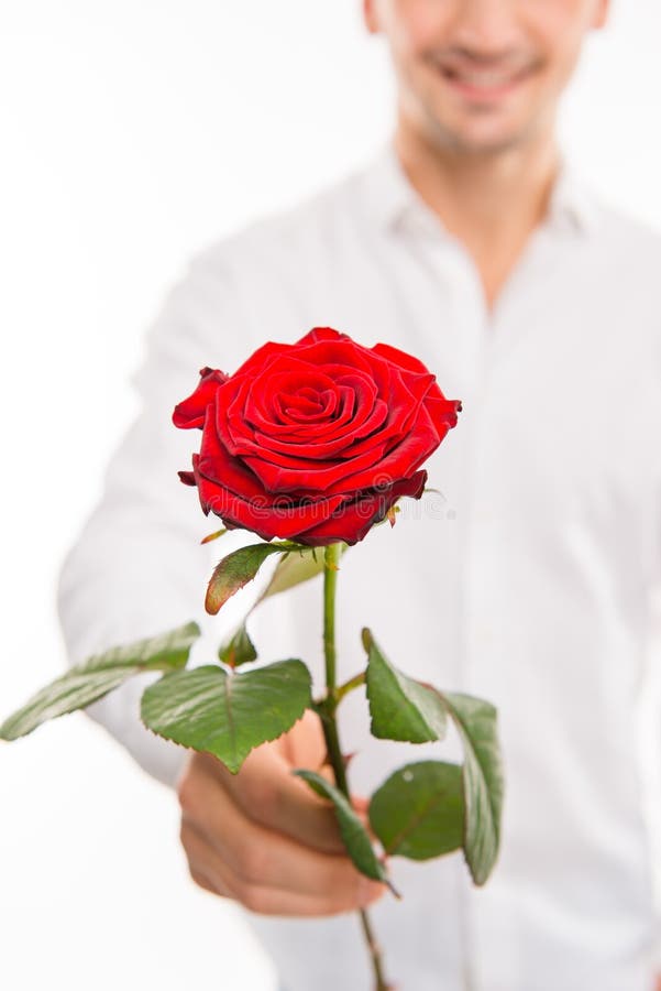 Closeup Photo of a Romantic Handsome Man with a Red Rose Stock Image ...