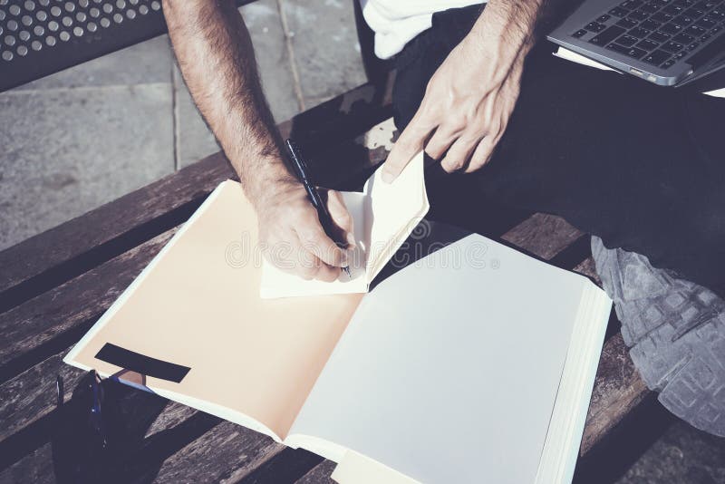 Closeup Photo Student Writing Textbook Message. Studying at the ...