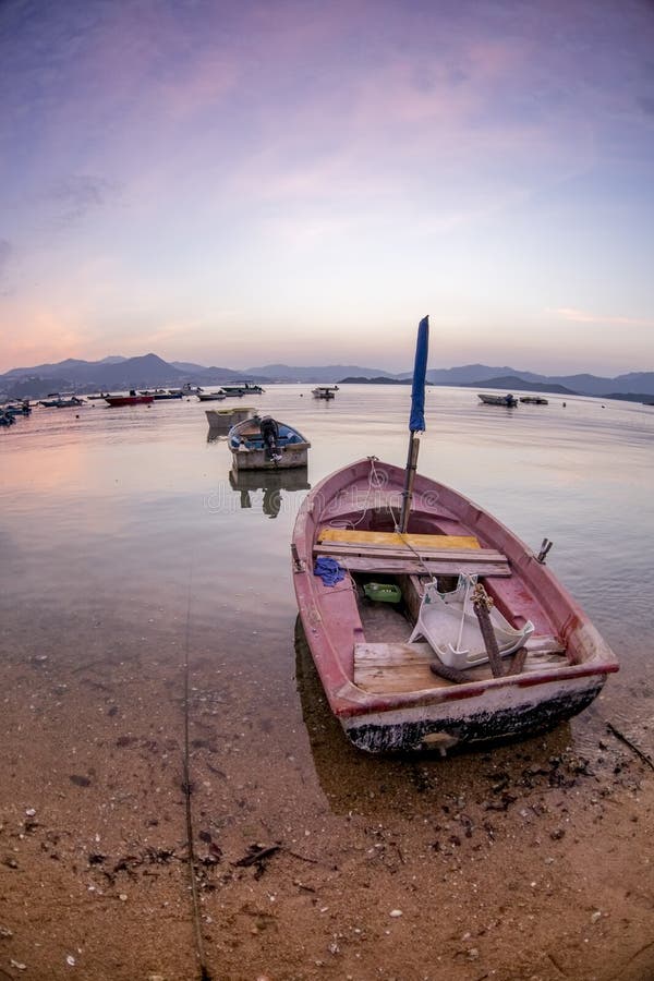 Closeup Photo Of White And Blue Boat Stock Image - Image of sand, ocean ...