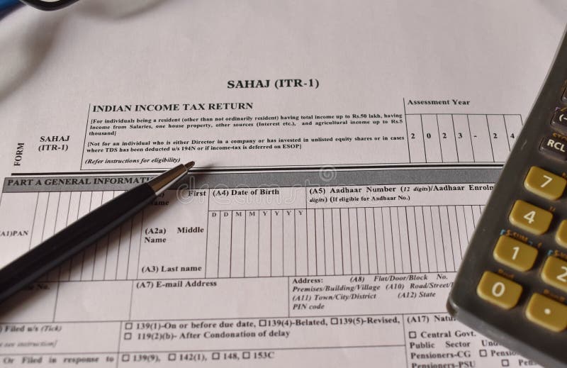 A Closeup Picture of ITR 1 Forms on a Table with a Black Pen on it ...