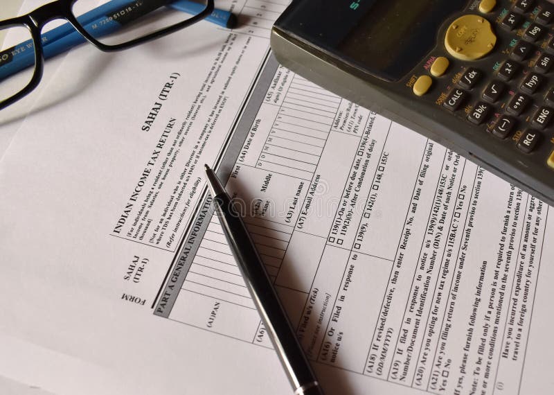 A Closeup Picture of ITR 1 Forms on a Table with a Black Pen on it ...