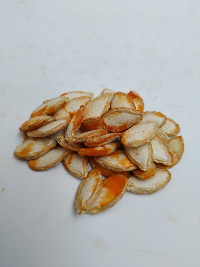 Pile and Heap of Dry Pumpkin Seeds Isolated on White Background ...