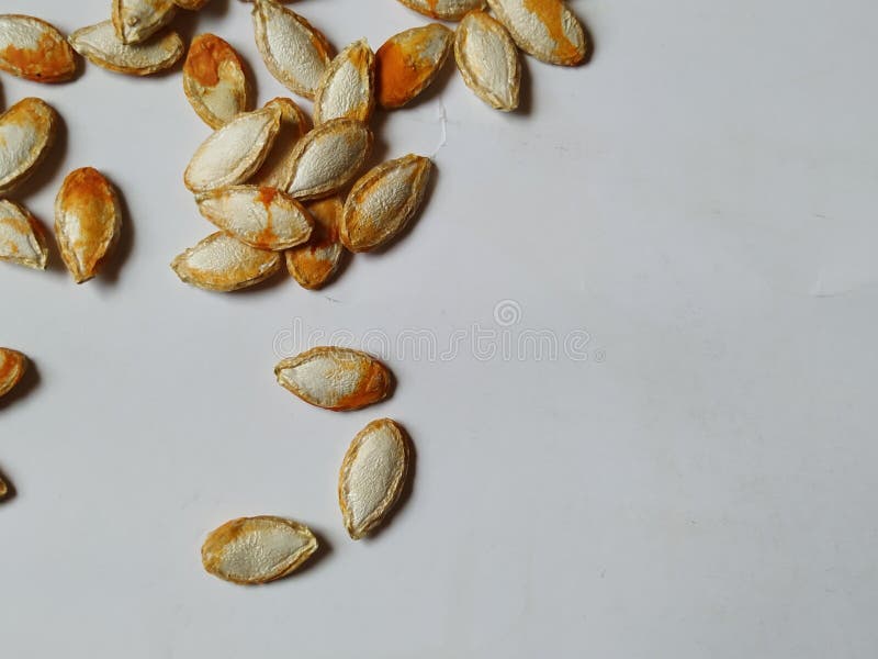 Pile and Heap of Dry Pumpkin Seeds Isolated on White Background ...