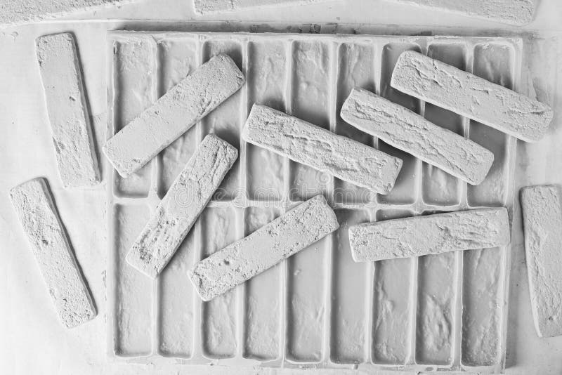 Closeup of Pile of White Decorative Brick Shapes on White Background ...