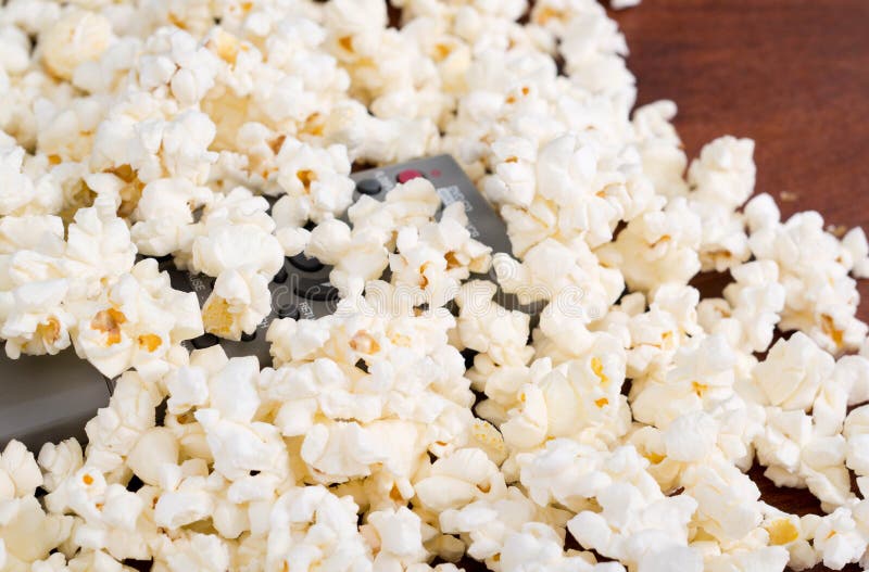 Closeup Pile of White Fluffy Popcorn with Tv Remote Control in the ...