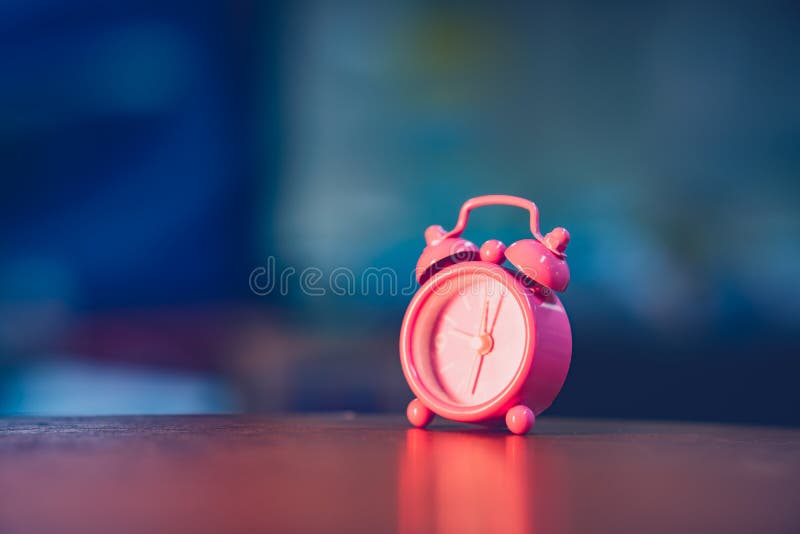 Closeup Pink Clock on Blurry Background Stock Photo - Image of time ...