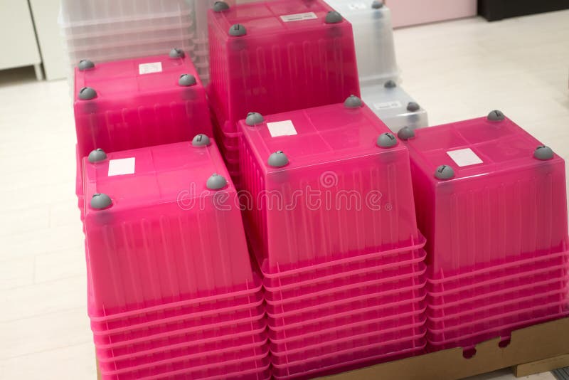 Pink Plastic Boxes Pile in Decoration Store Stock Photo - Image of ...